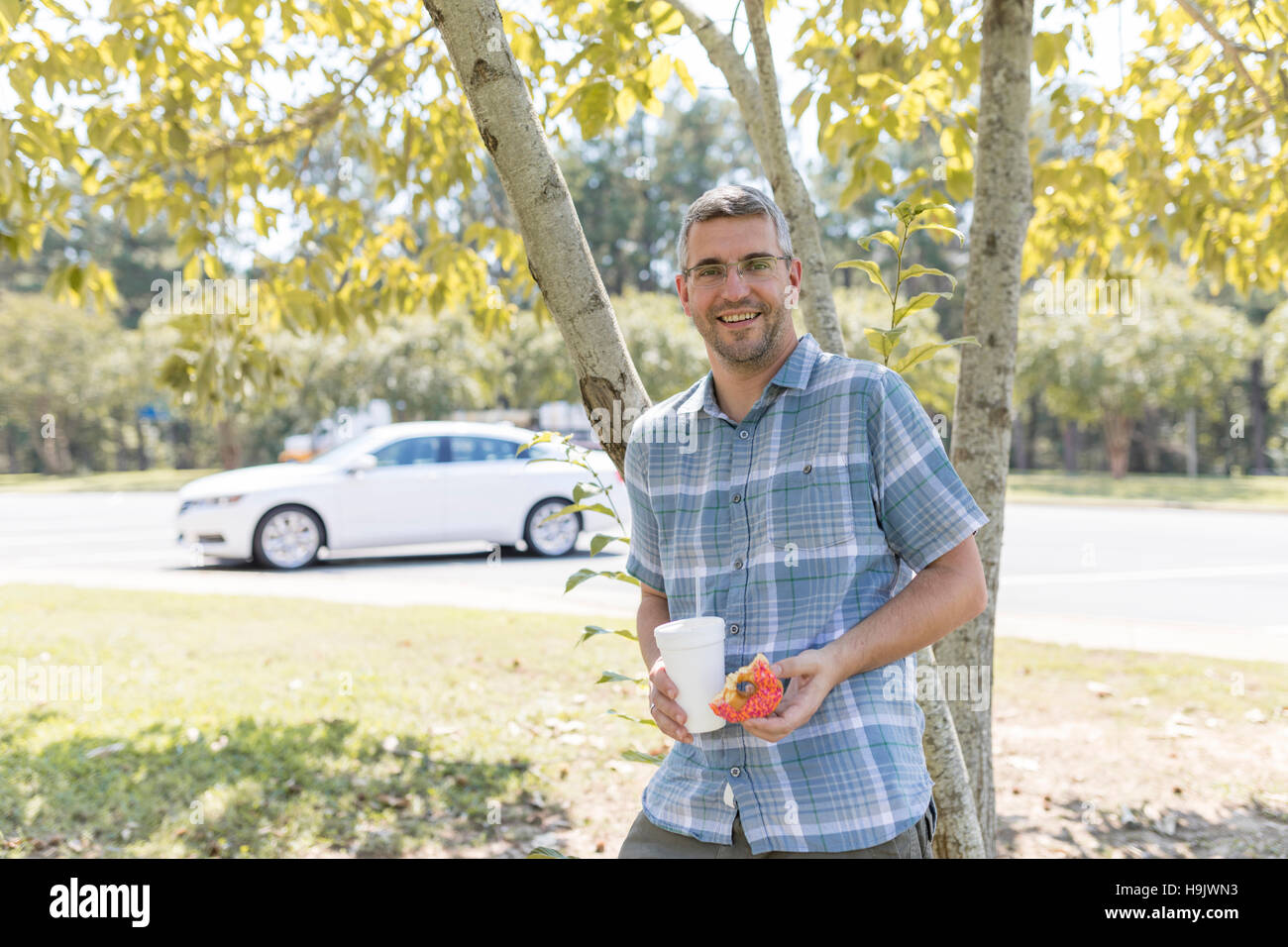 Man on a road trip taking a rest hi-res stock photography and images ...