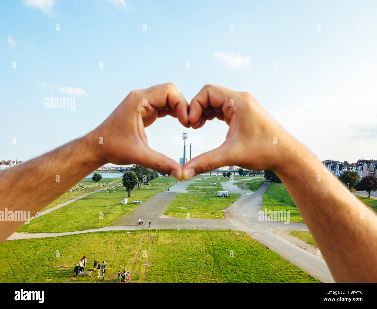 Hands forming a heart framing hi-res stock photography and images - Alamy
