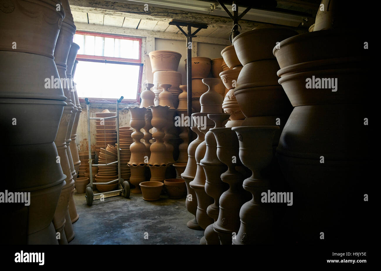 Pots and vases in warehouse of a pottery Stock Photo - Alamy