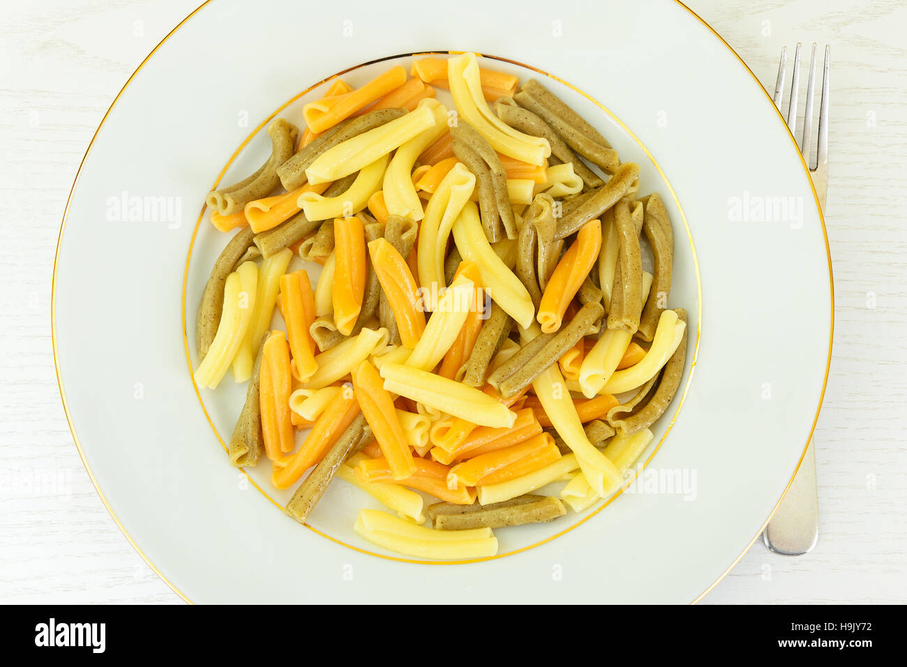 Pasta. Colorful Noodles on Plate. Studio Photo Stock Photo - Alamy