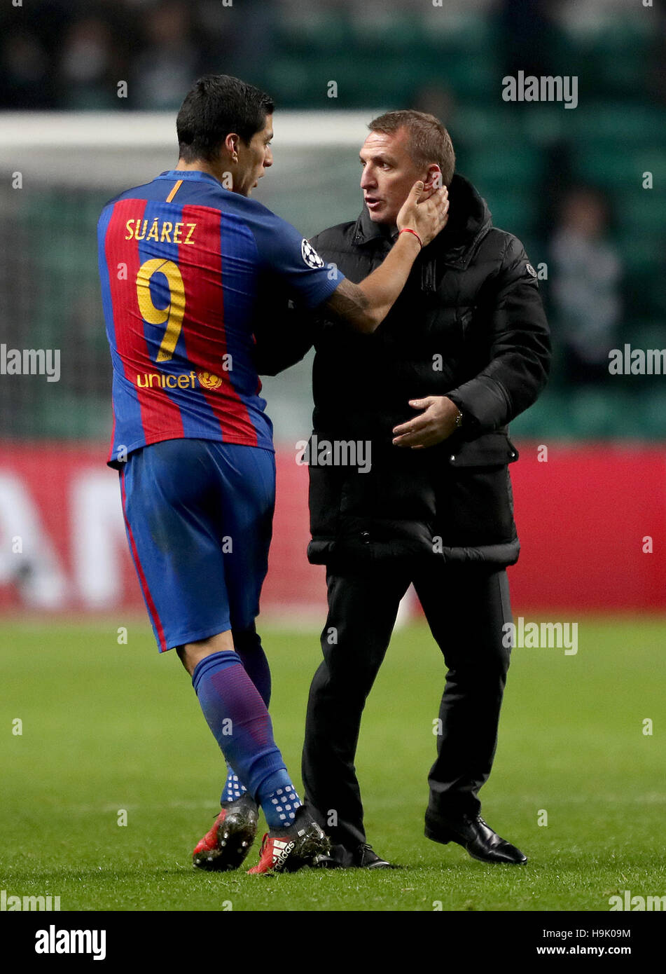 Barcelona's Luis Suarez (left) with Celtic manager Brendan Rodgers ...