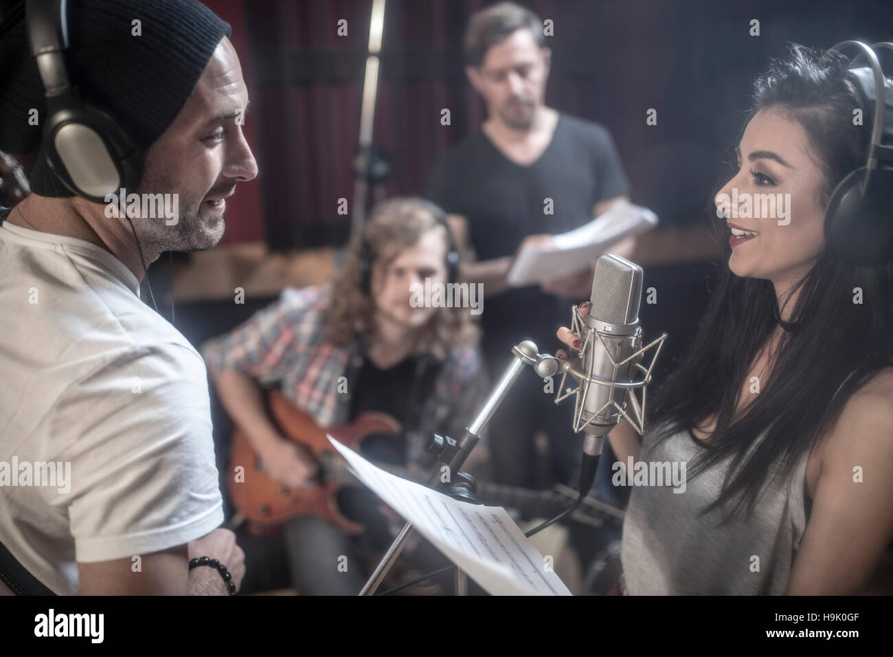 Band rehearsal in recording studio Stock Photo - Alamy