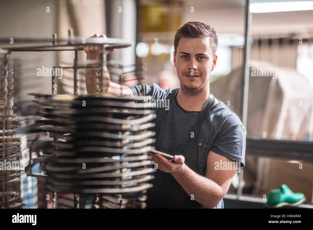 Smiling shoemaker hi-res stock photography and images - Alamy