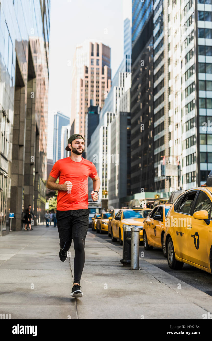 USA, New York City, man running in Manhattan Stock Photo - Alamy