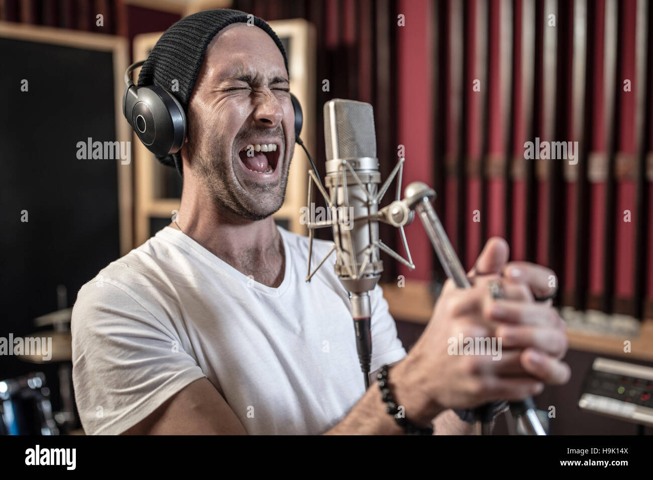 Singer at recording studio Stock Photo - Alamy