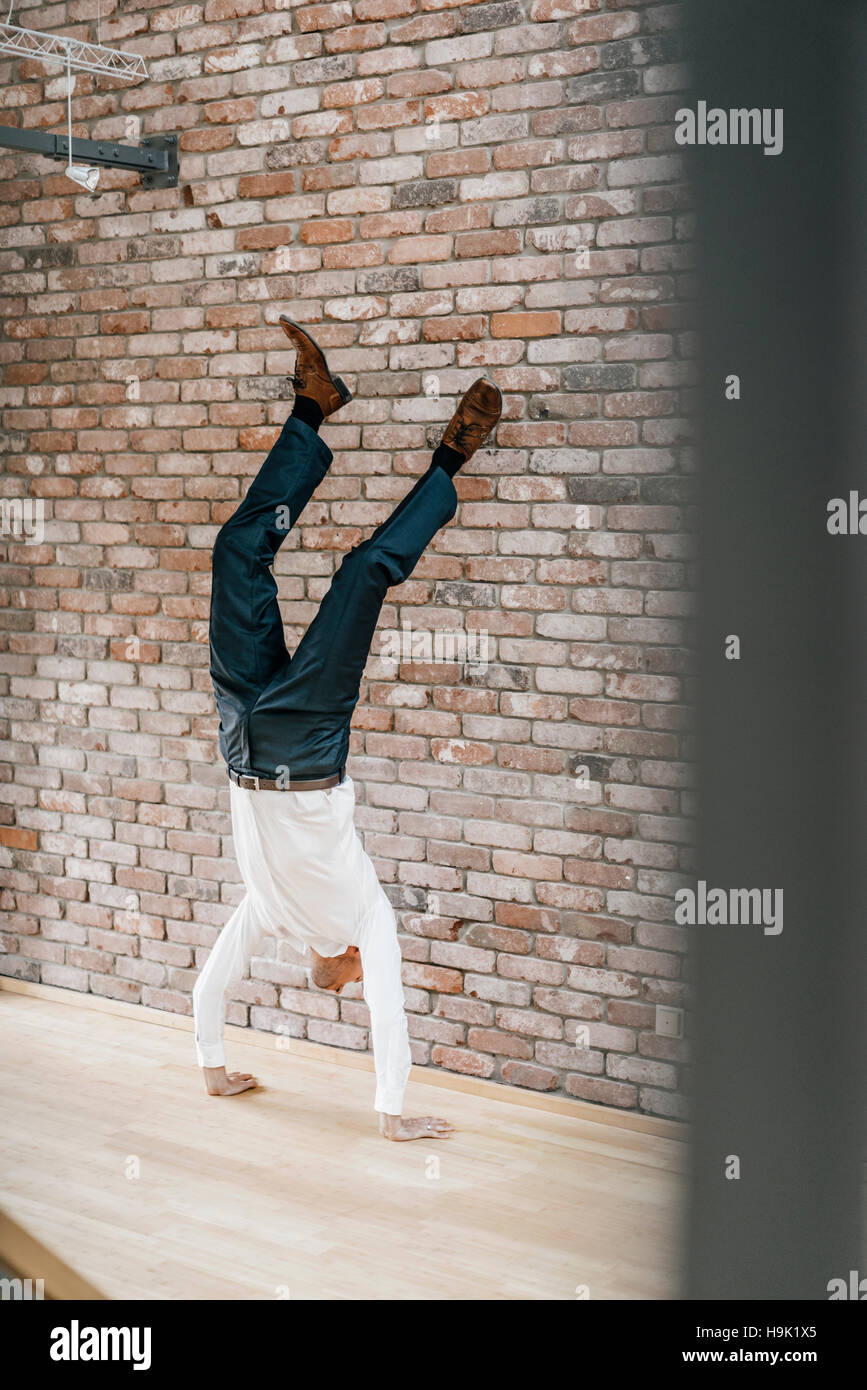 Brick handstand hi-res stock photography and images - Alamy