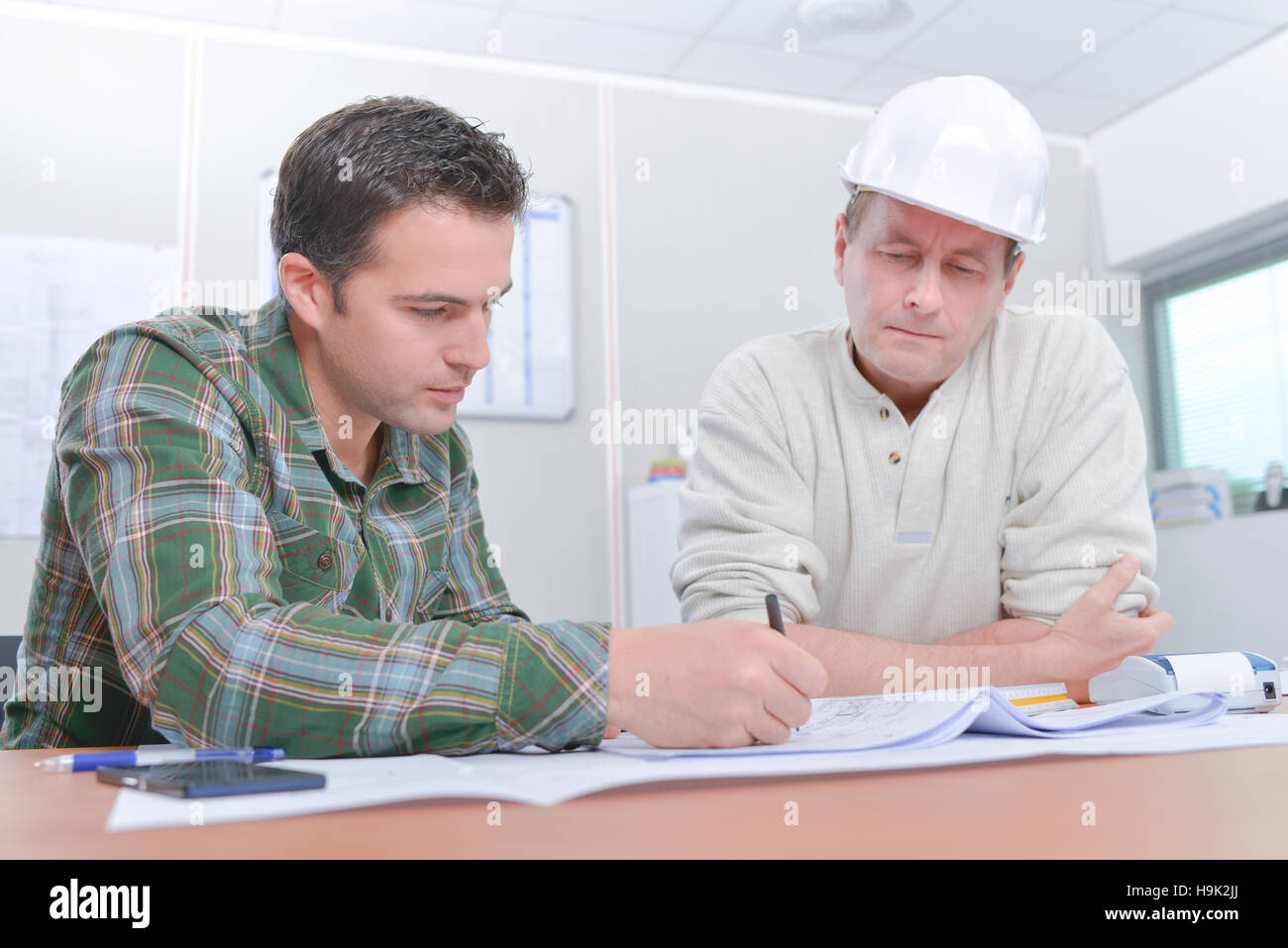 Architects working on the same project Stock Photo - Alamy