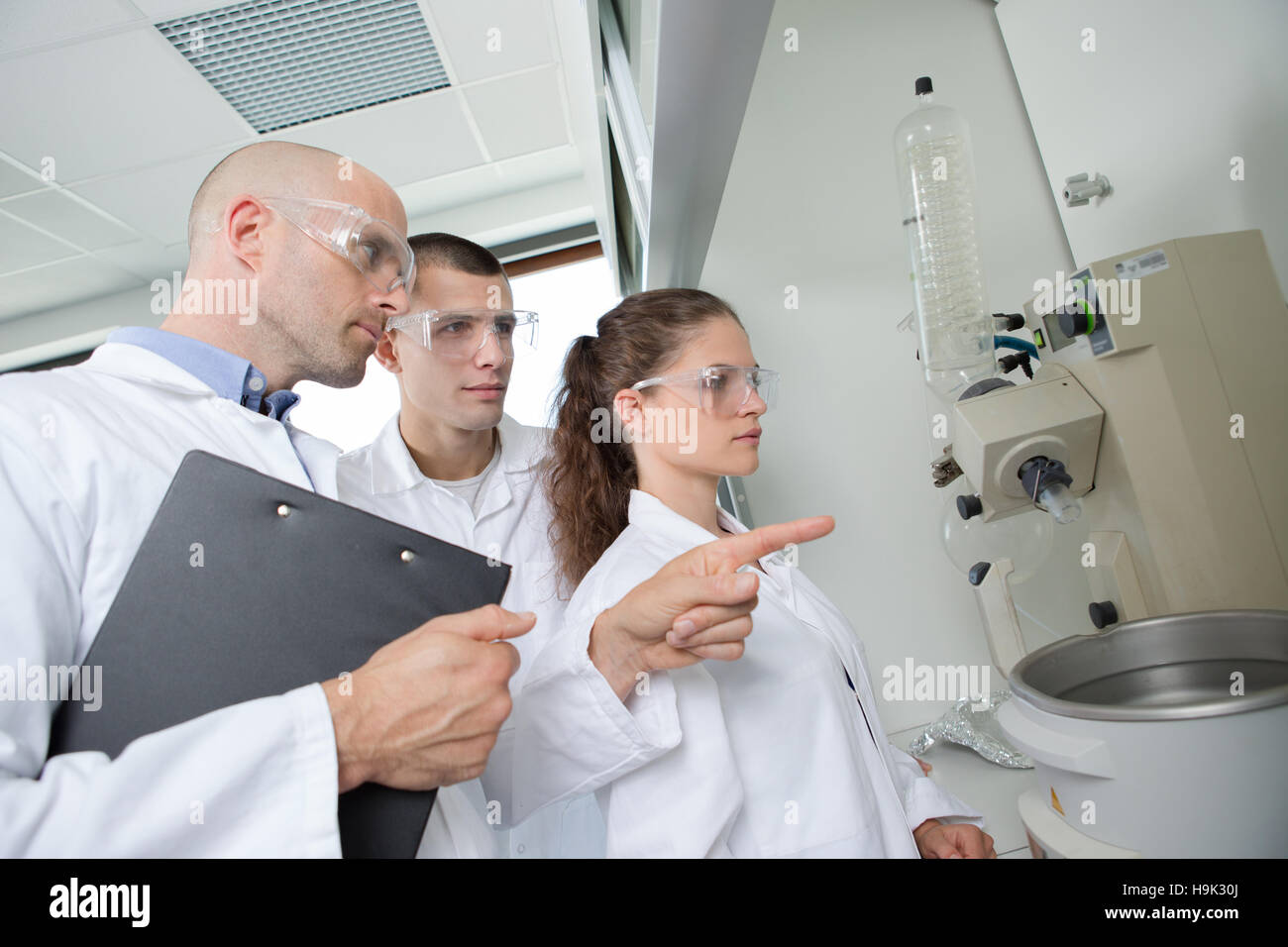 group of scientists working at the laboratory Stock Photo - Alamy