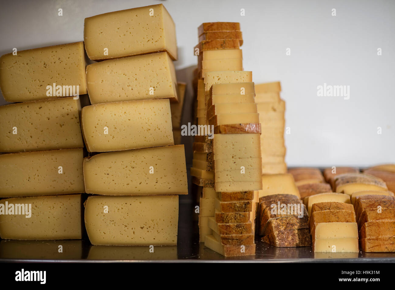 Cheese pieces in factory, ready to get packed Stock Photo - Alamy
