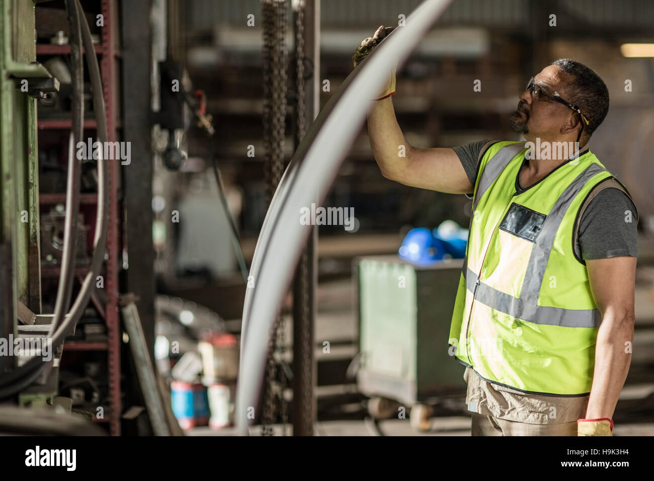 Engineer examining construction parts Stock Photo - Alamy