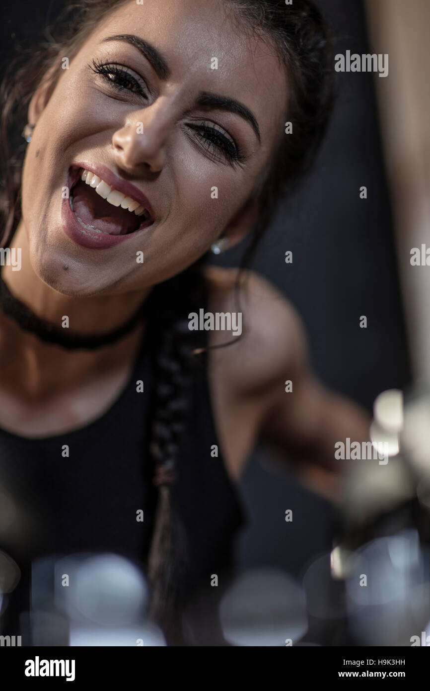 Portrait of female rock singer Stock Photo - Alamy