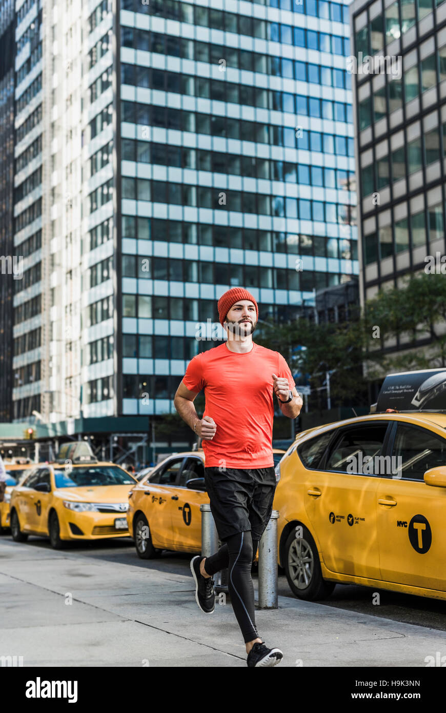 USA, New York City, man running in Manhattan Stock Photo - Alamy