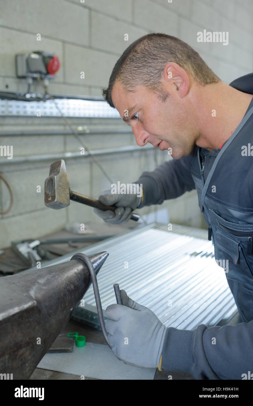 bending a metal Stock Photo - Alamy
