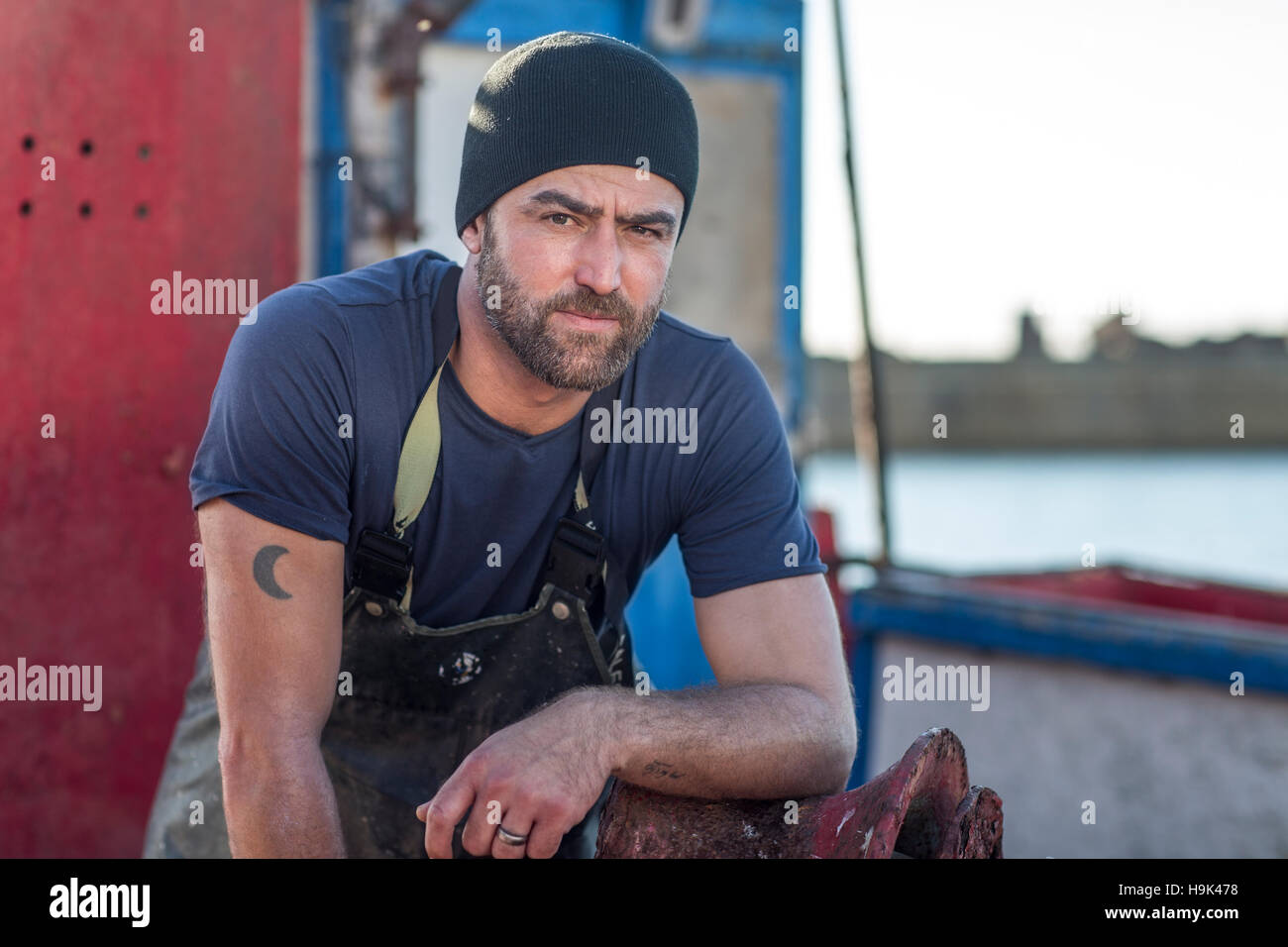 Fisherman working on trawler Stock Photo - Alamy