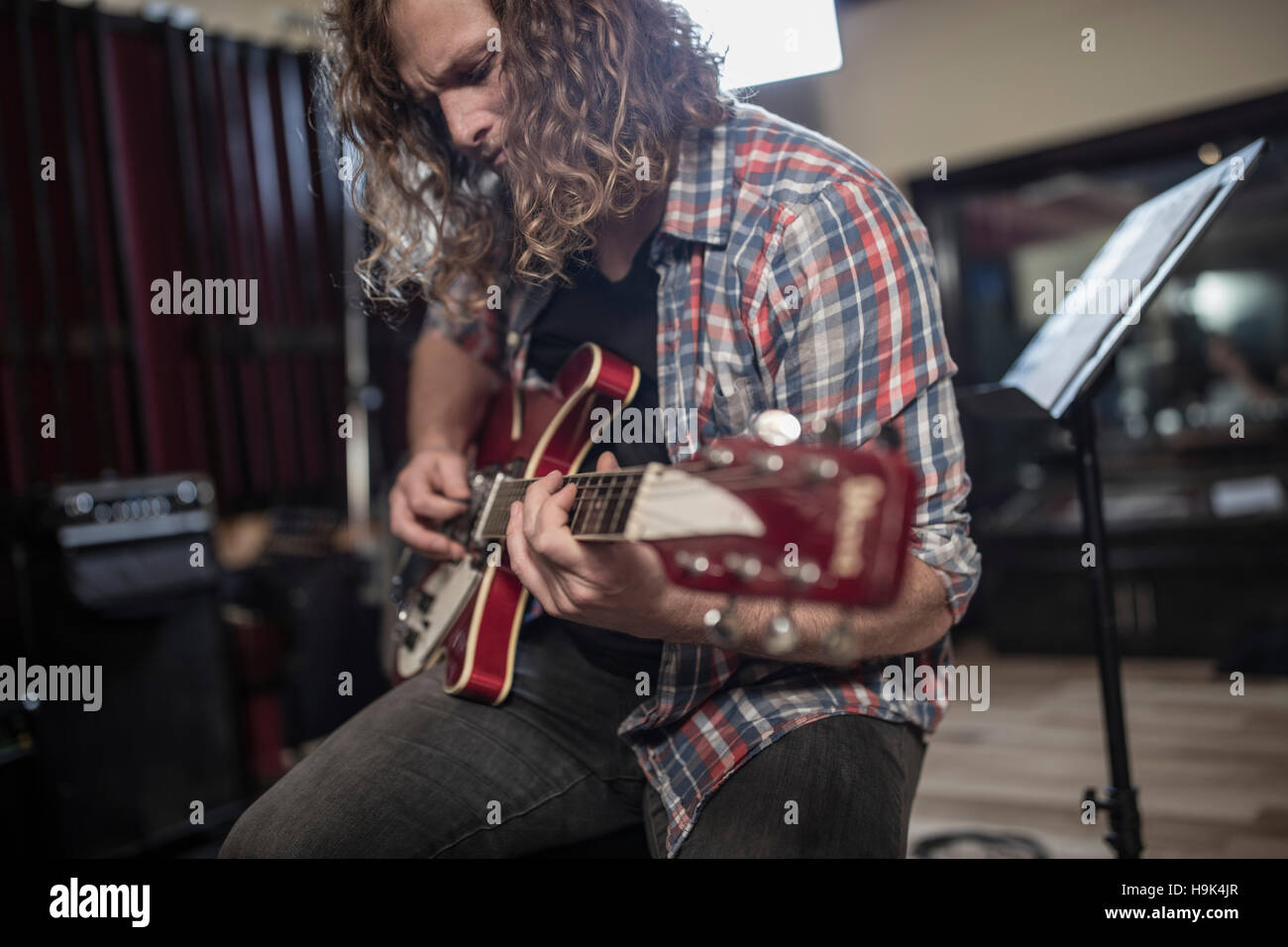 Guitarist at recording studio Stock Photo - Alamy