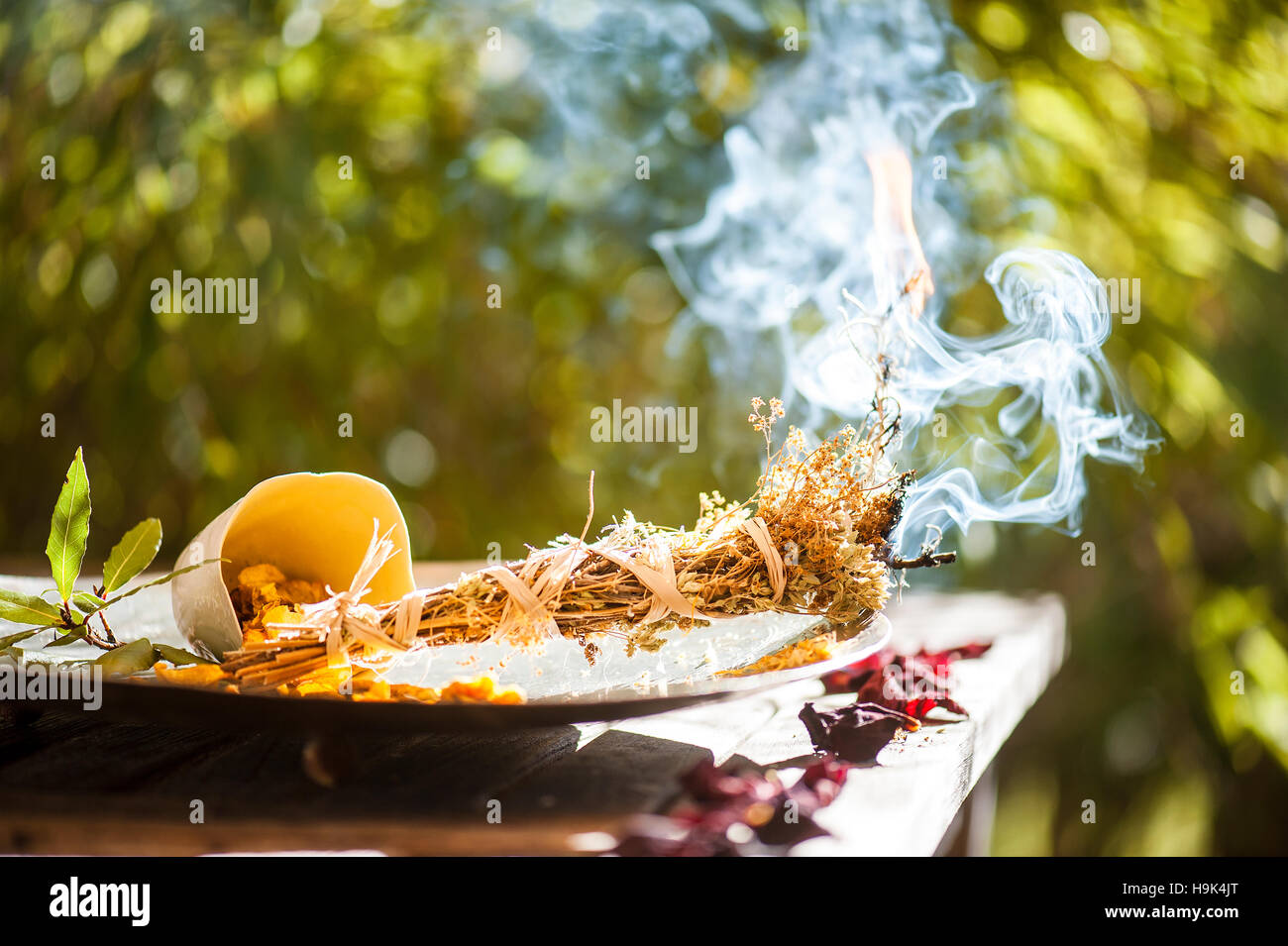 Smoke of dried herbs Stock Photo - Alamy