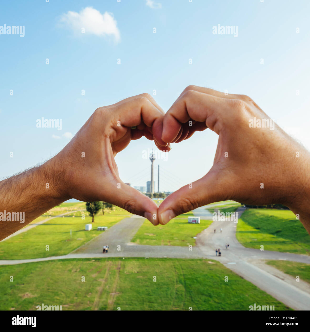 Hands forming a heart framing hi-res stock photography and images - Alamy