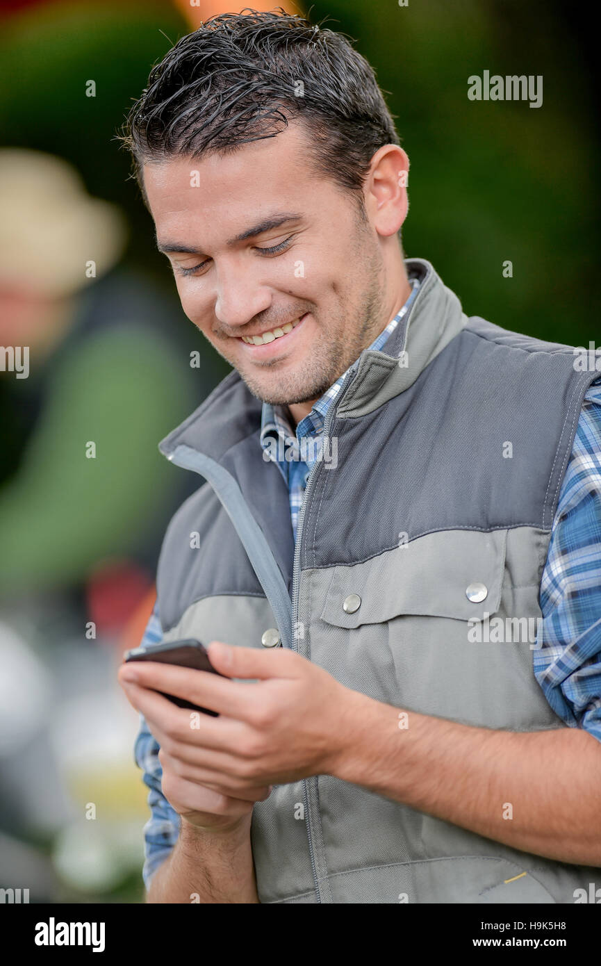 Man staring at cell phone hi-res stock photography and images - Alamy
