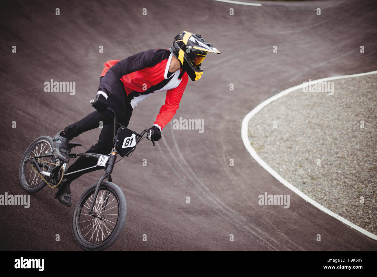Cyclist riding BMX bike Stock Photo - Alamy