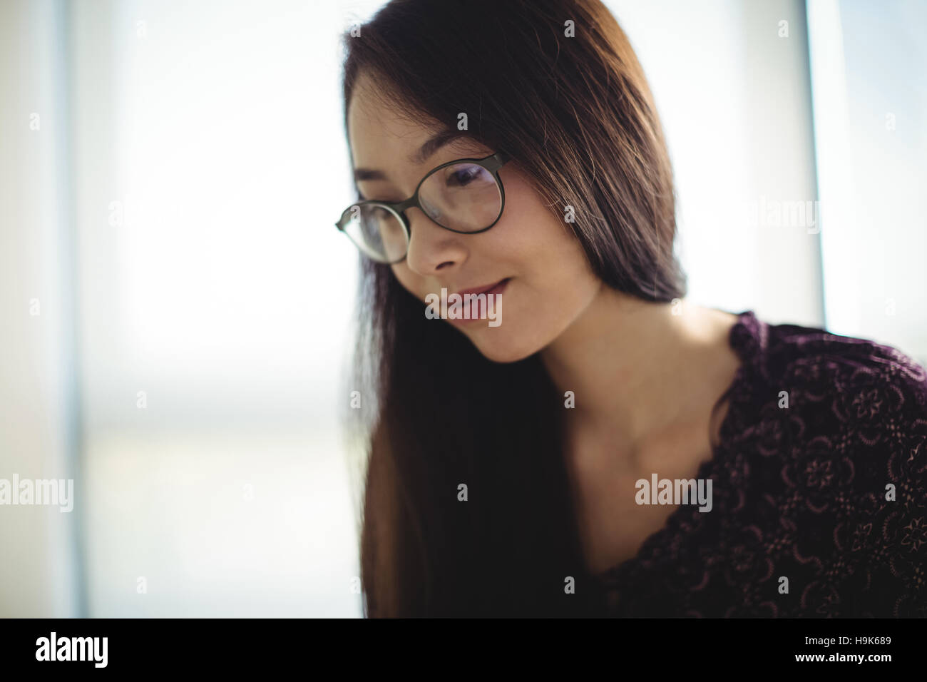 Business executive wearing spectacles Stock Photo - Alamy
