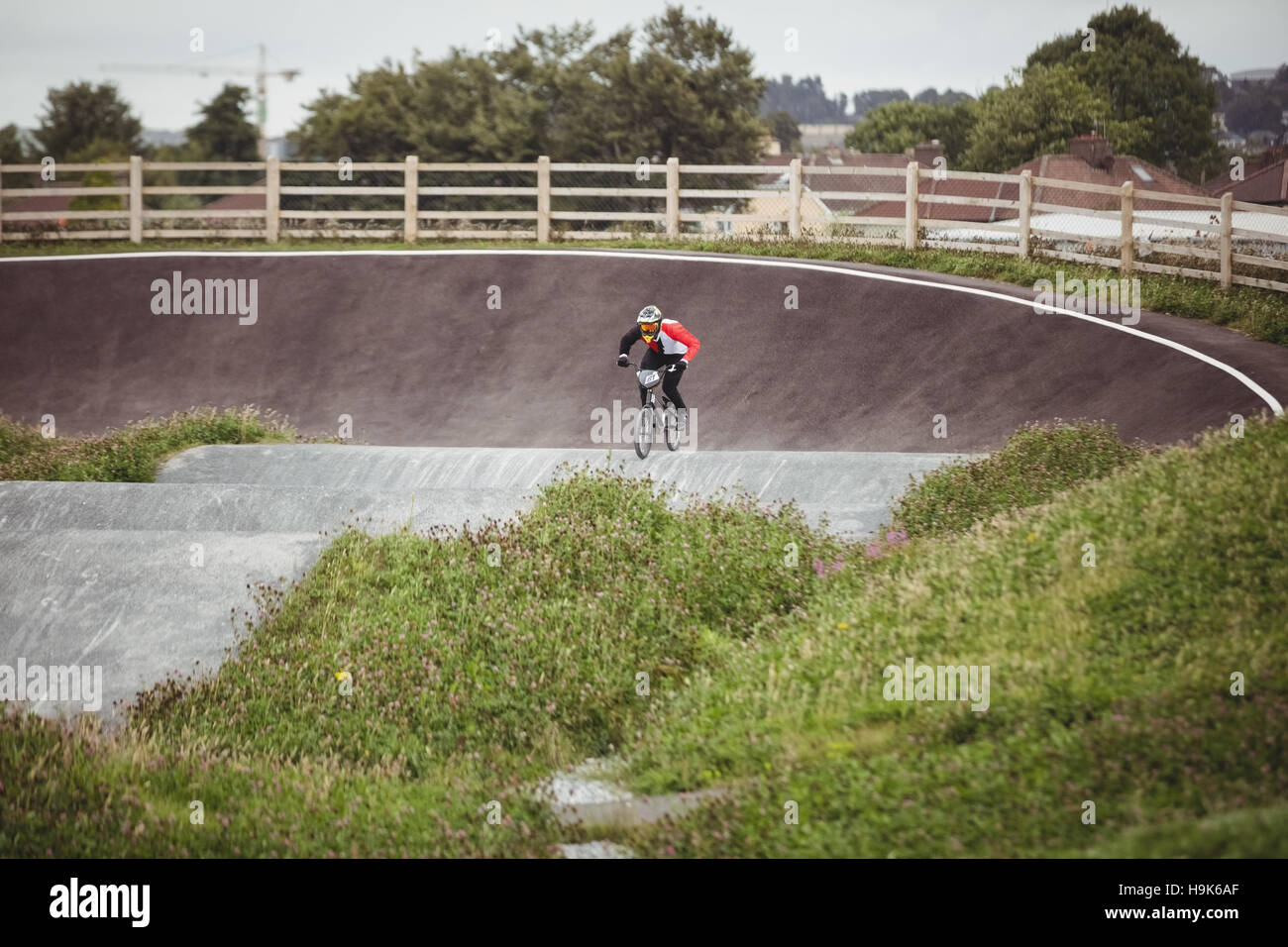 Cyclist riding BMX bike Stock Photo - Alamy