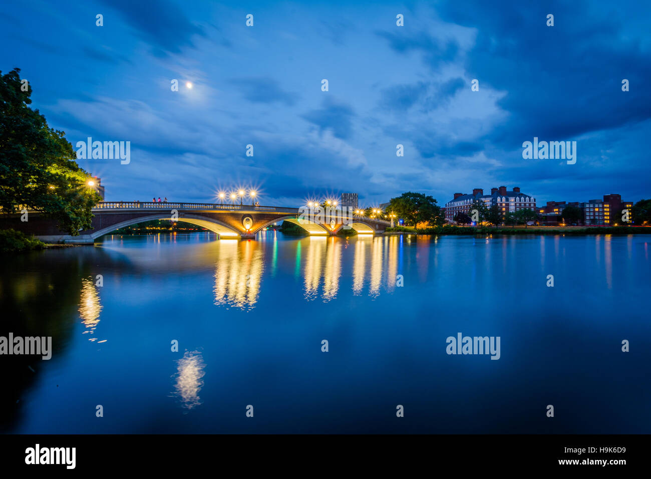 The moon over the John W Weeks Bridge and Charles River at night, in ...