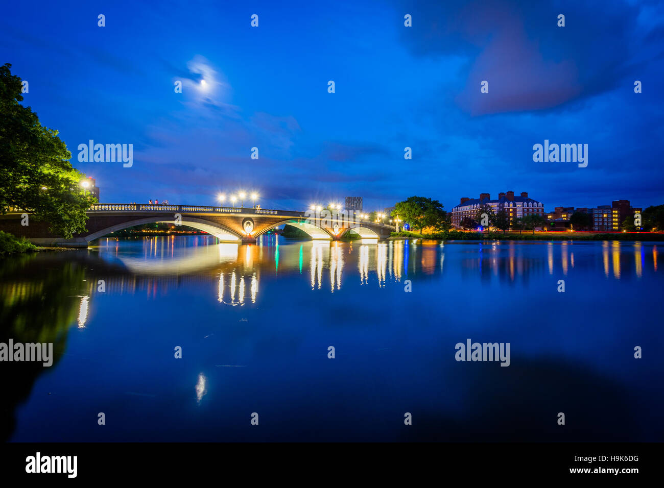 The moon over the John W Weeks Bridge and Charles River at night, in ...