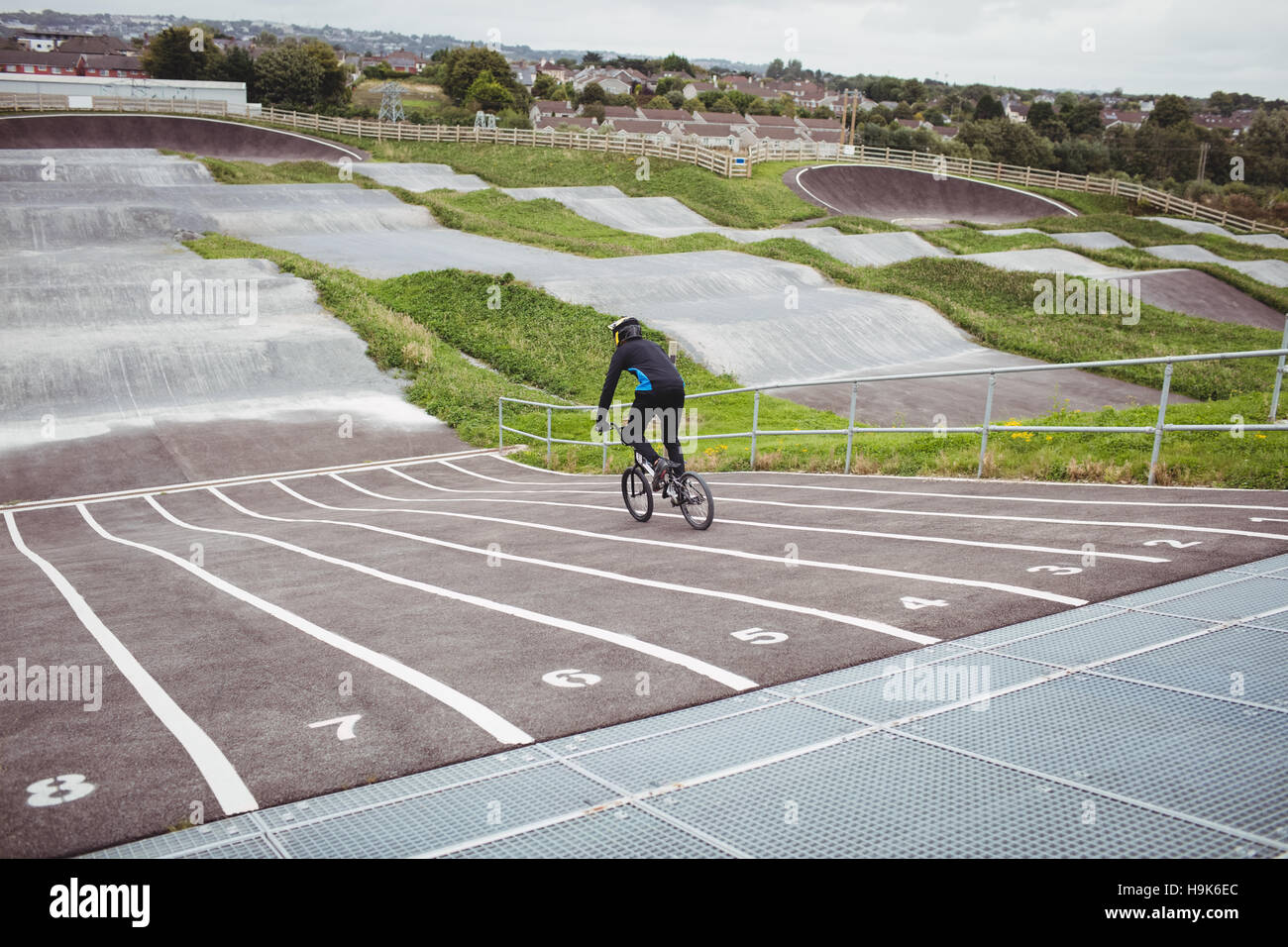 Cyclist riding BMX bike Stock Photo - Alamy
