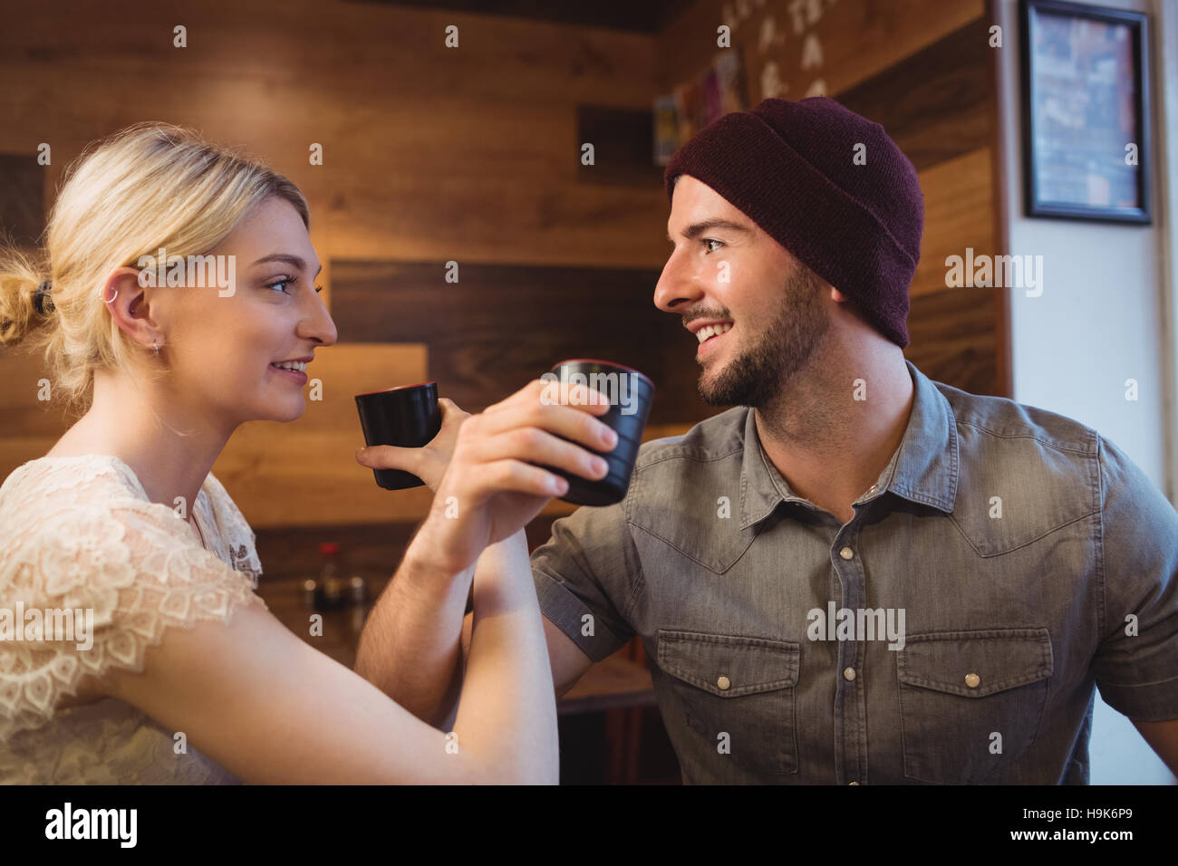 Couple having sake drink in restaurant Stock Photo - Alamy
