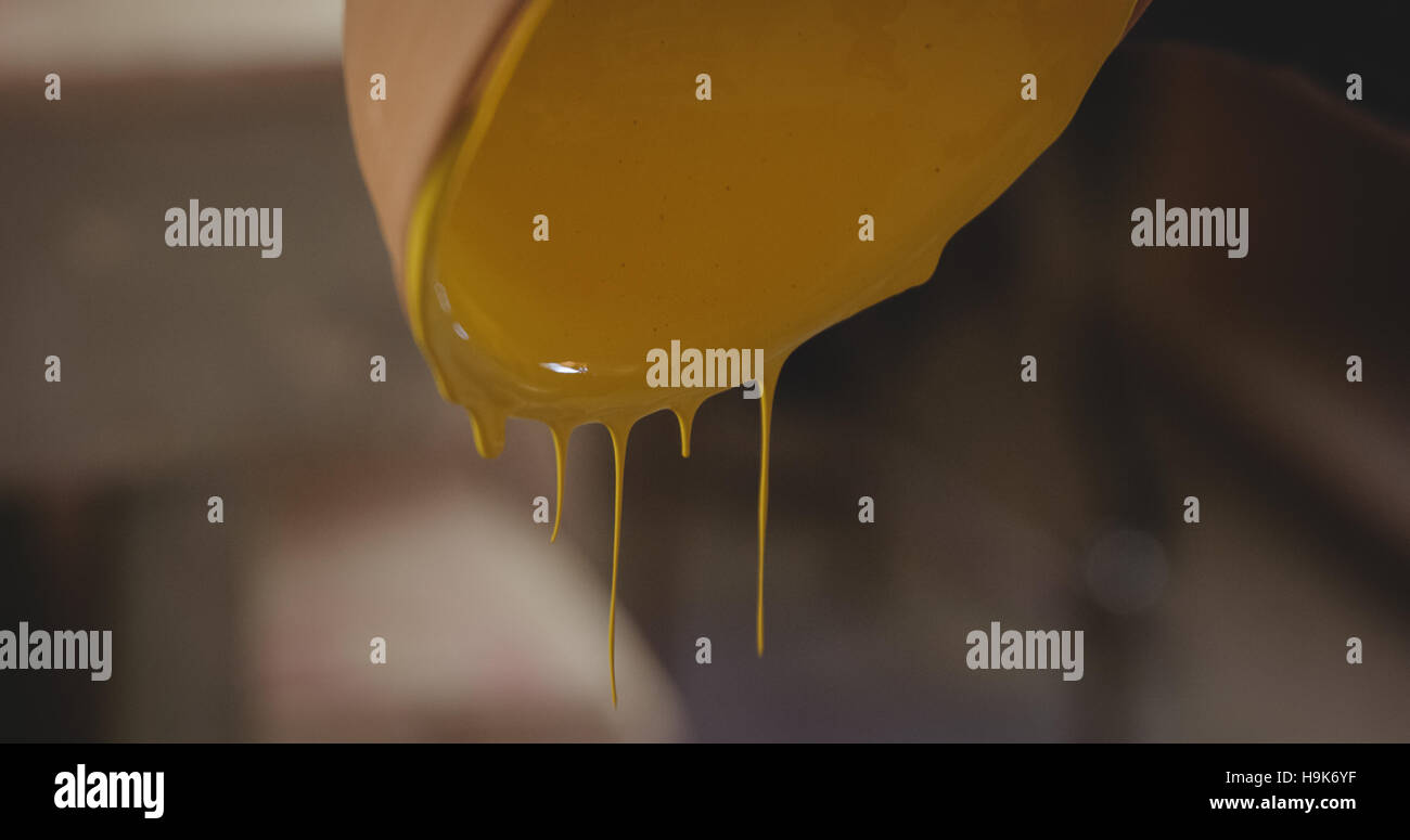 Watercolor dripping from bowl Stock Photo - Alamy