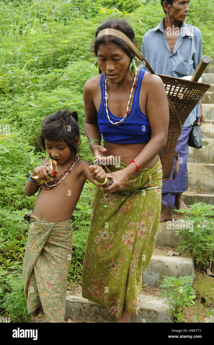 A Bangladeshi Tribal woman with her daughter in Bandarban District in ...