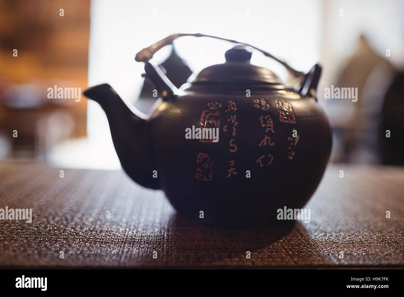 Traditional japanese sake teapot on table Stock Photo - Alamy