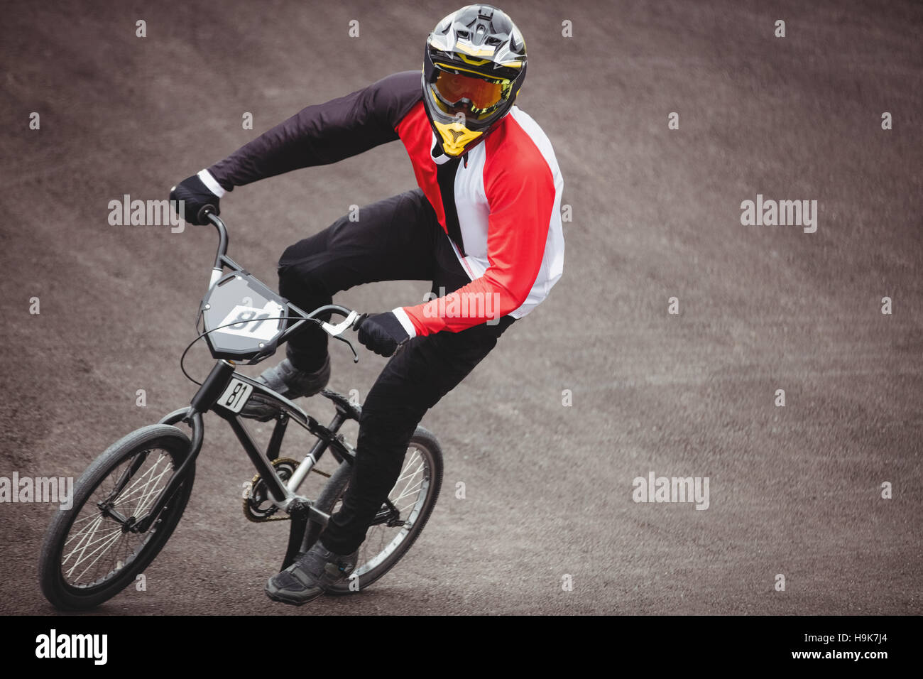Cyclist riding BMX bike Stock Photo - Alamy