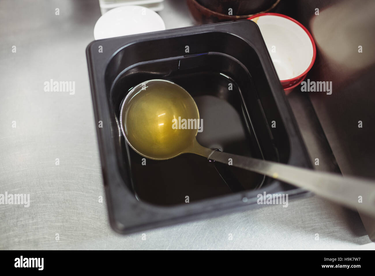 Oil in container Stock Photo - Alamy
