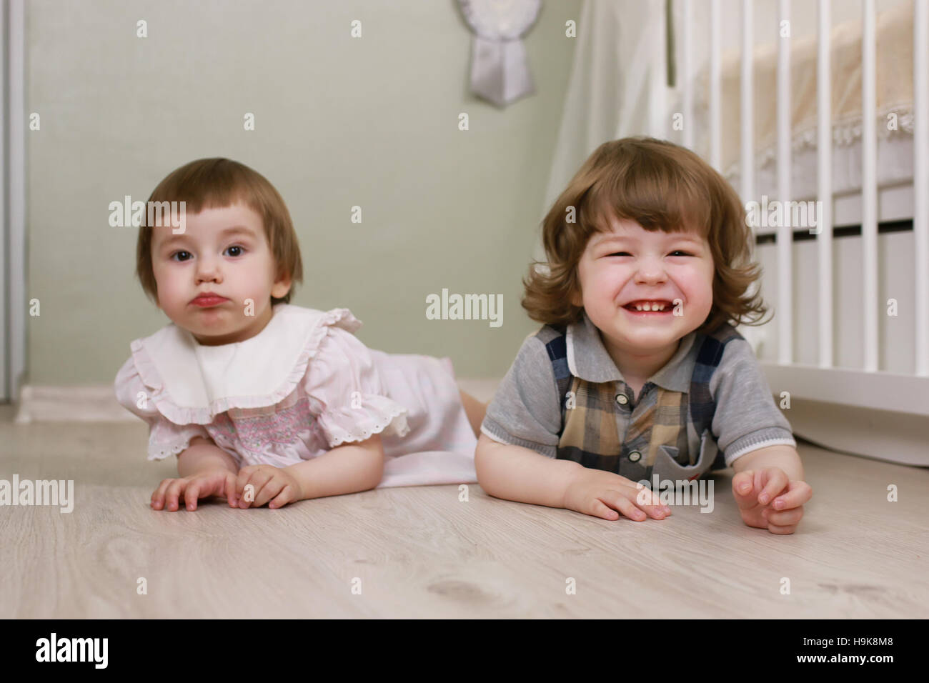 little kid sit in cot Stock Photo - Alamy