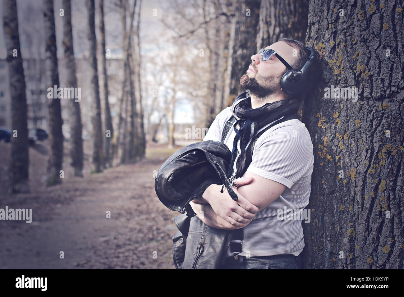 retro toned effected photo of alone man on street Stock Photo - Alamy