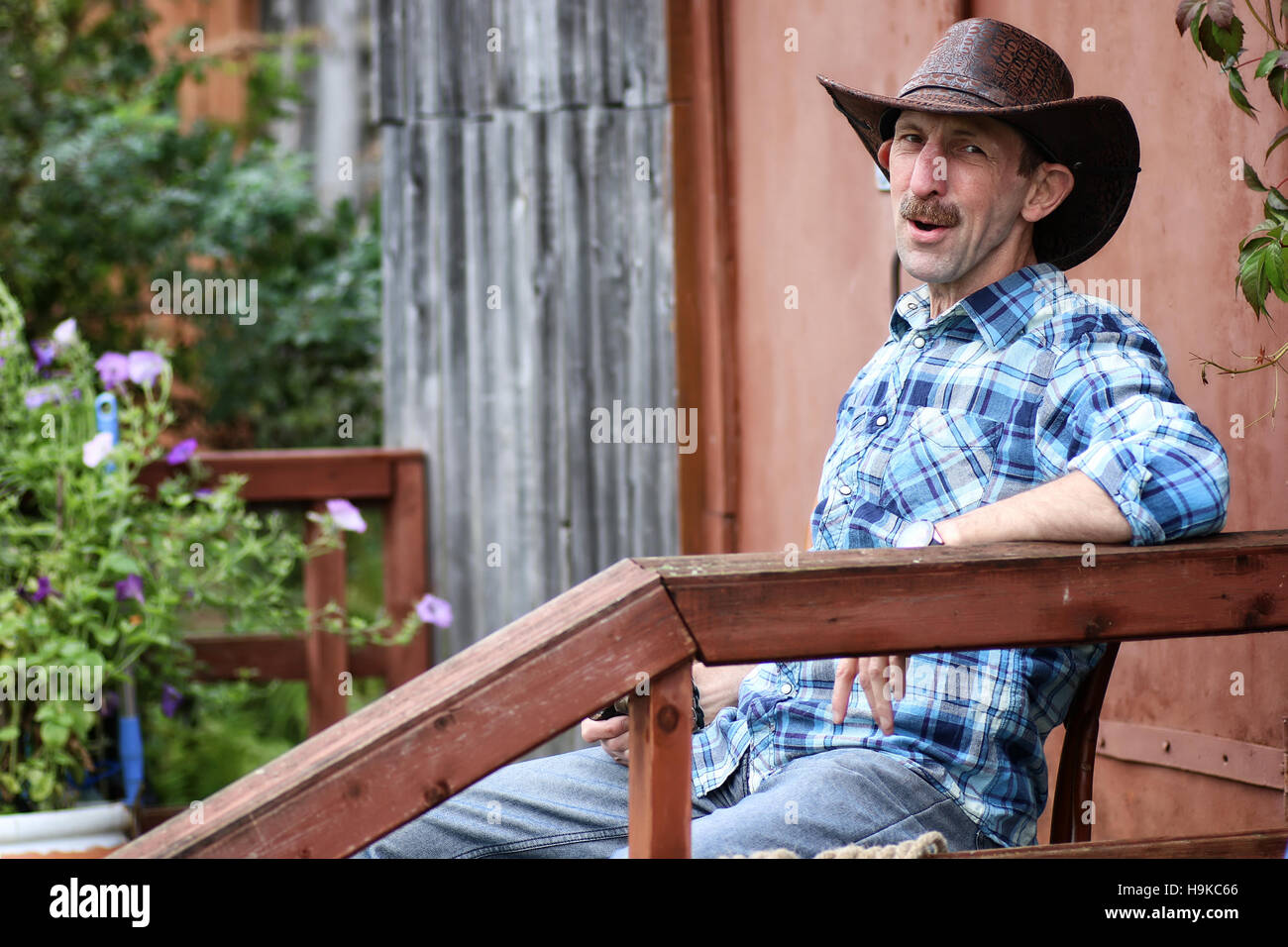 cowboy man smoke pipe Stock Photo - Alamy