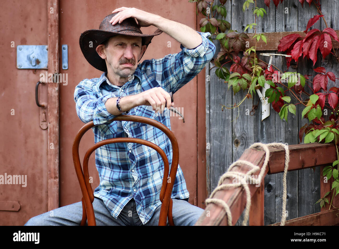 cowboy man smoke pipe Stock Photo - Alamy