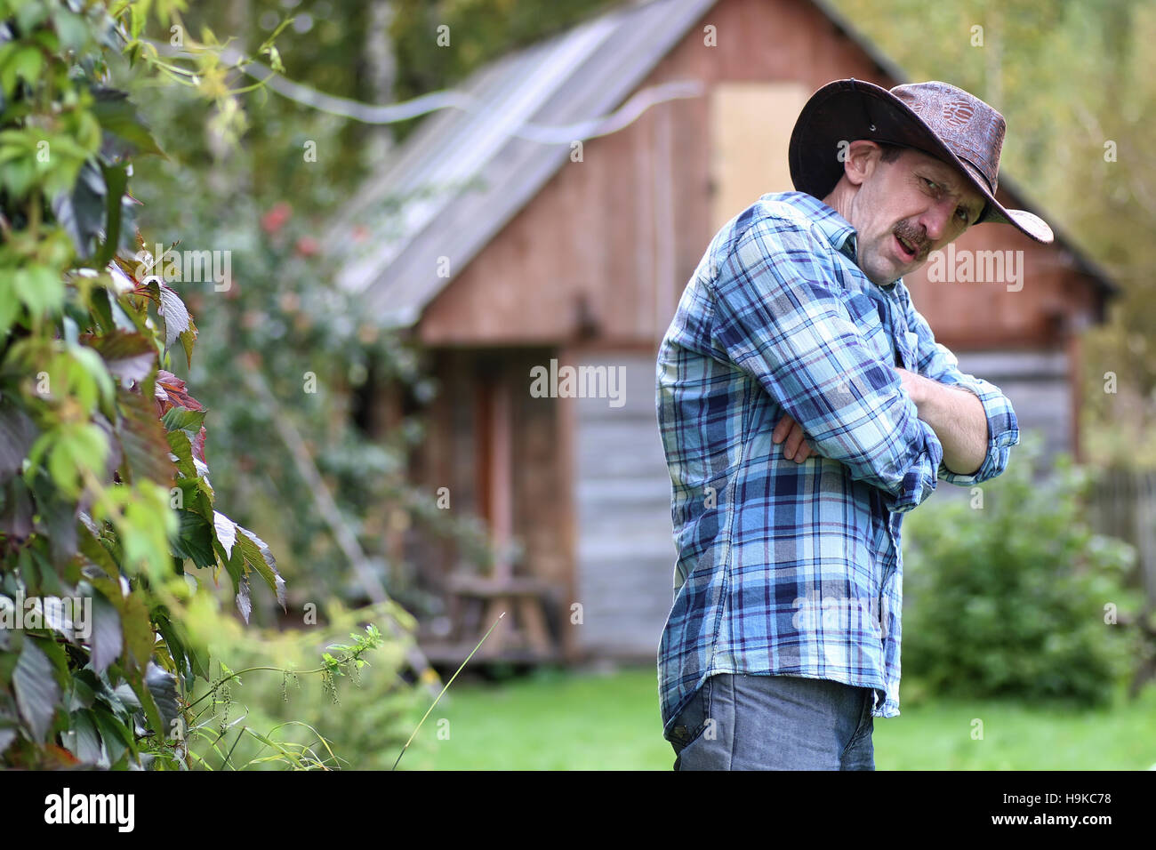 cowboy man smoke pipe Stock Photo - Alamy
