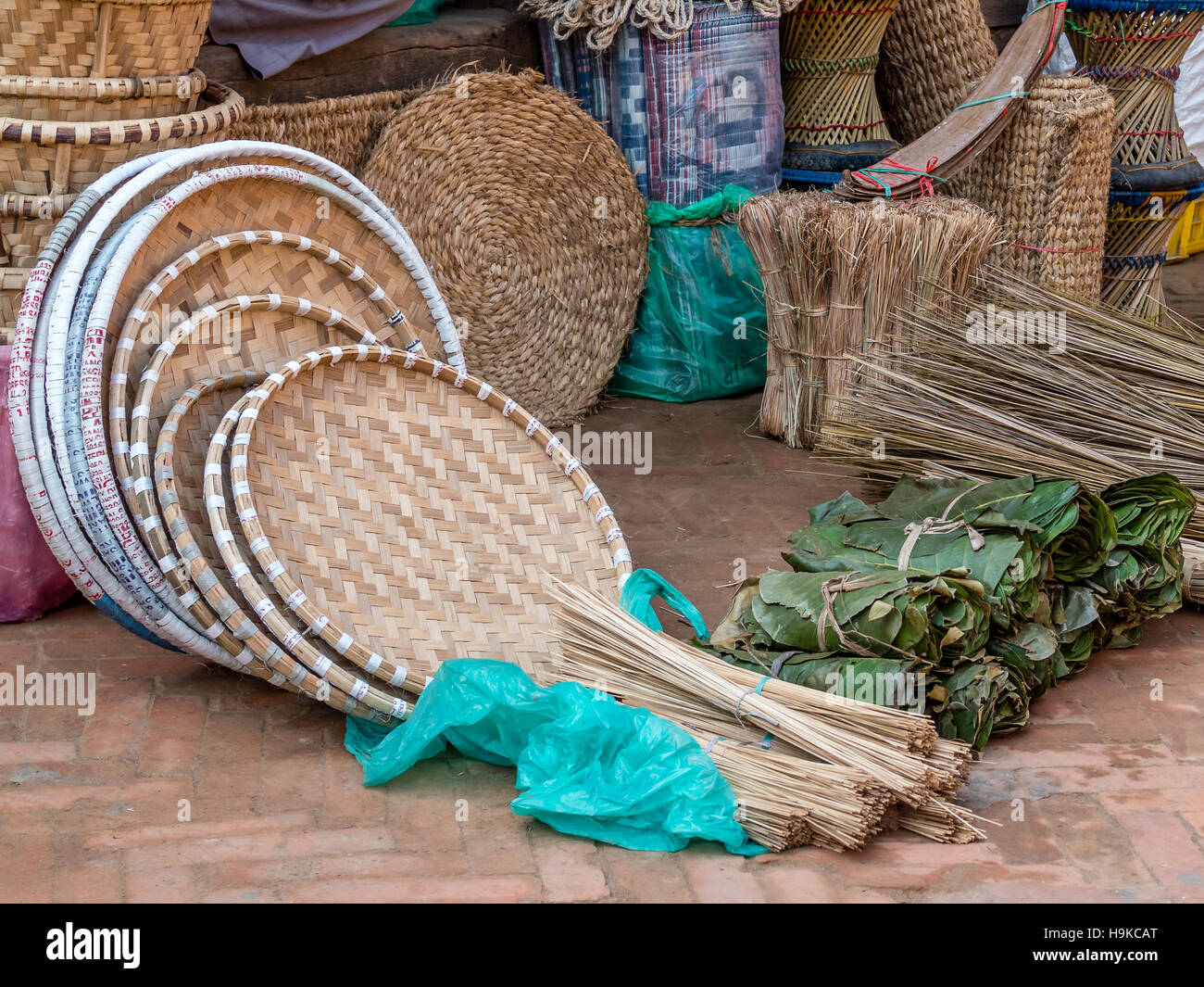Woven trays and baskets for sale at street vendor's stall Stock Photo ...