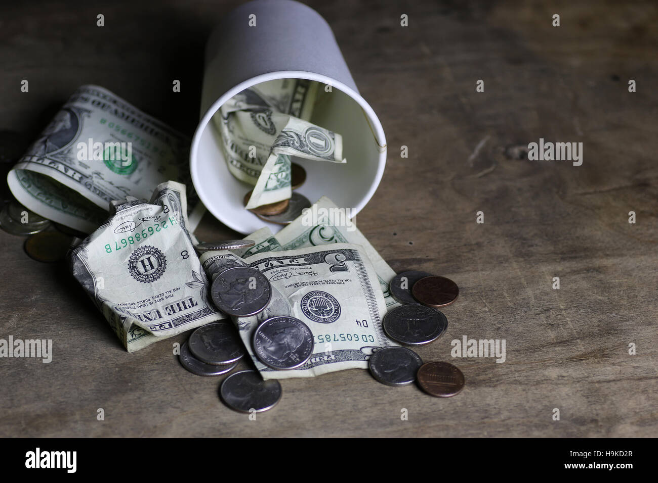 begging coin money Stock Photo - Alamy