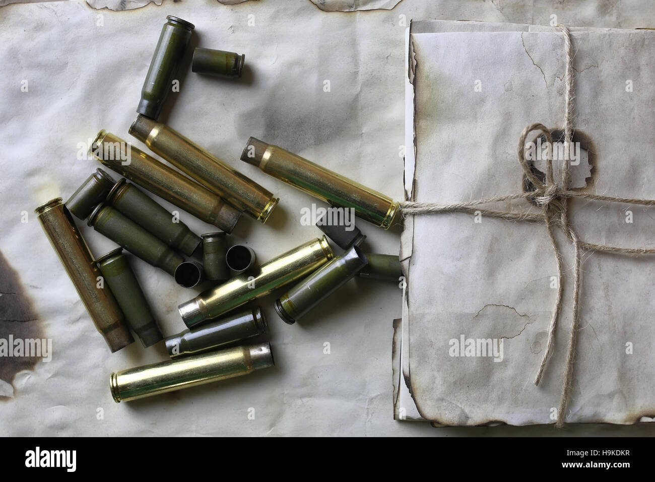 bullet and retro paper on the table Stock Photo - Alamy