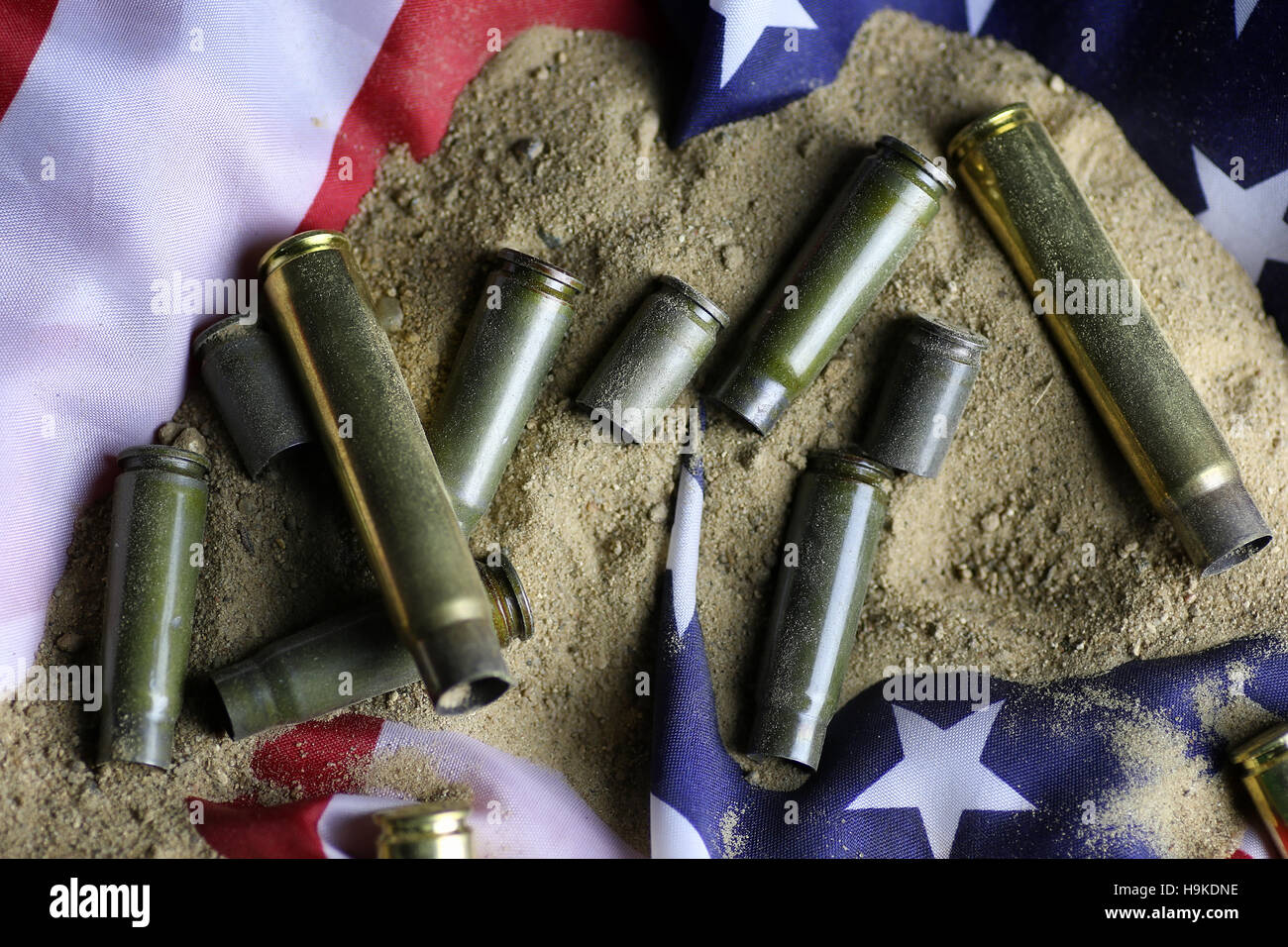 bullet and usa flag in the sand war Stock Photo - Alamy