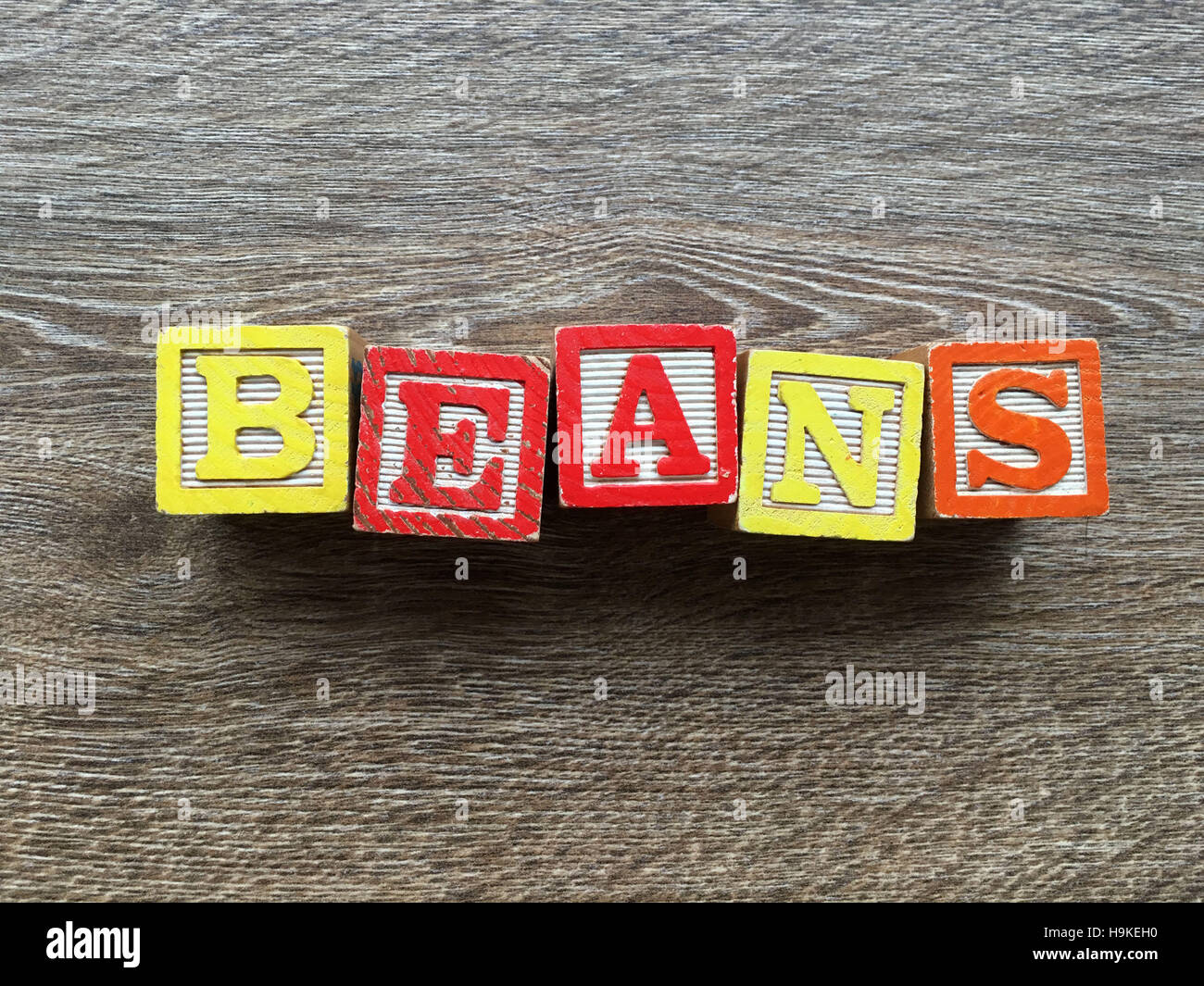 Alphabet wood blocks making the word BEANS Stock Photo - Alamy