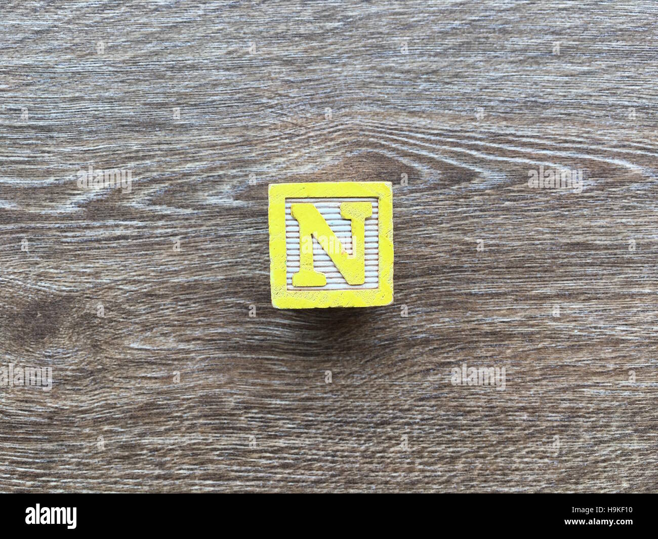 Wood Cube or Block with the N Letter Stock Photo - Alamy