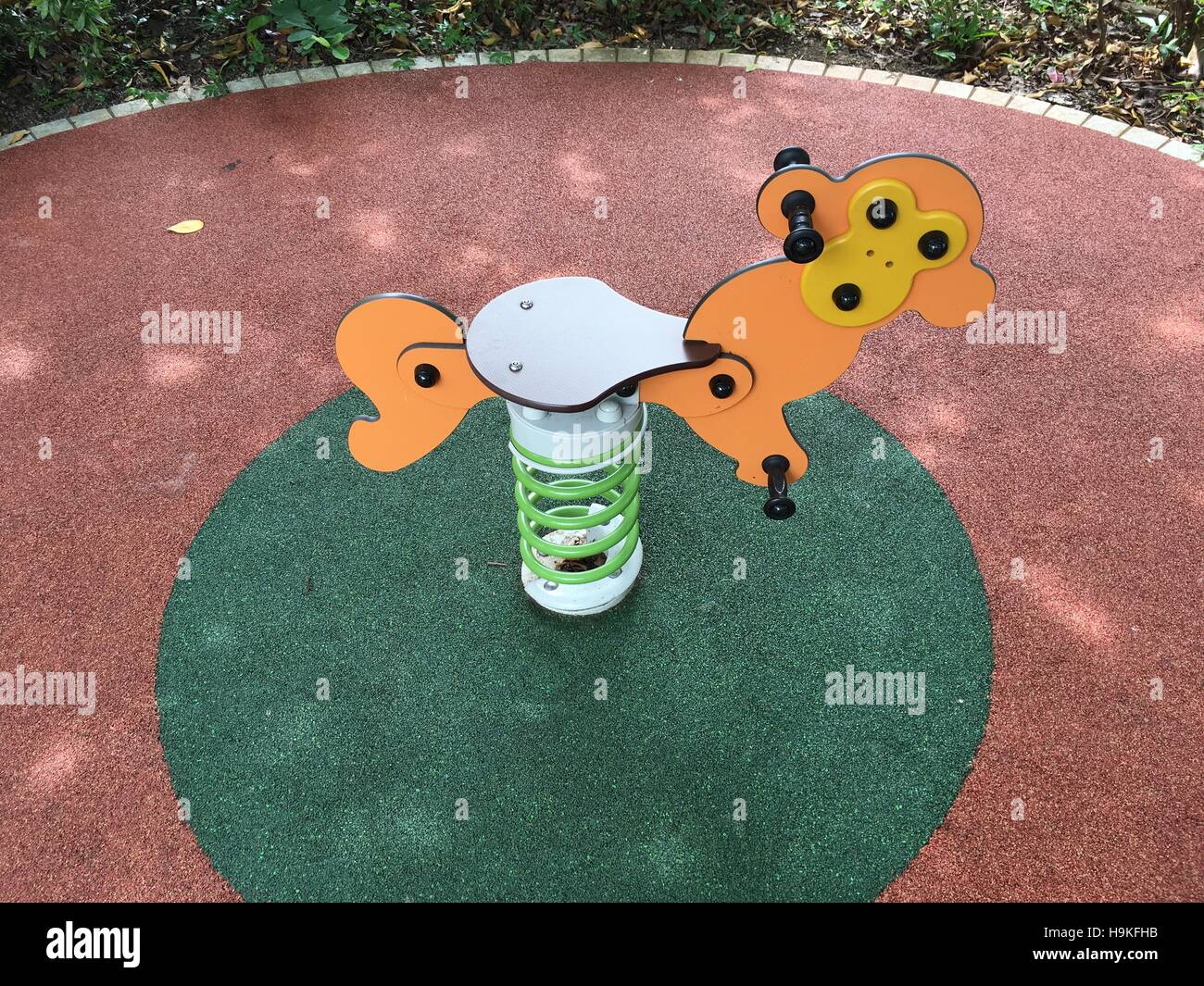 Monkey swing game in a kid playground, outdoor. It is on spring Stock ...