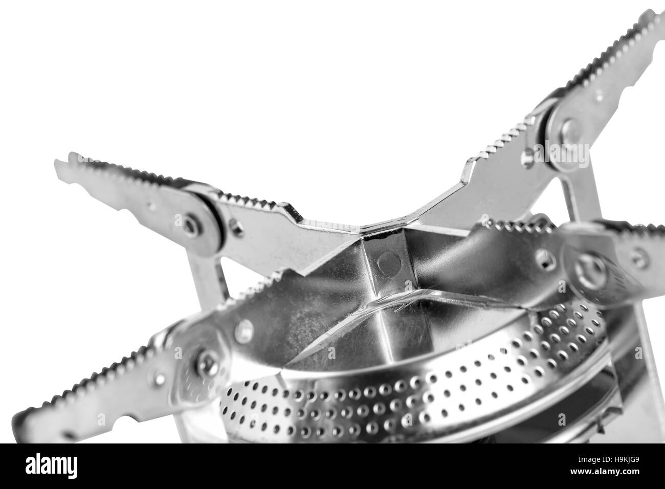 Fragment of metal torch removed with selective focus isolated on white ...