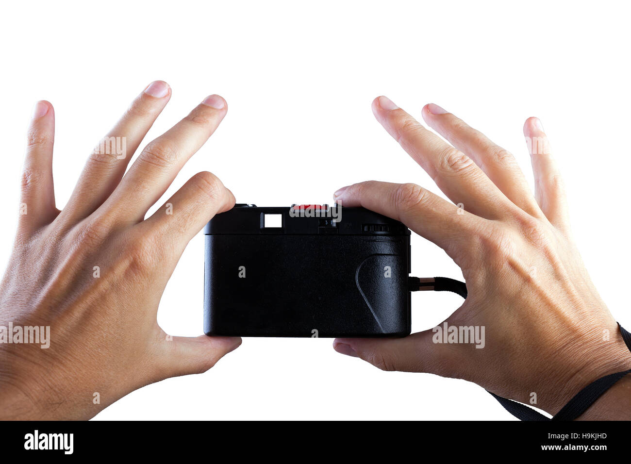 Travel concept. Hand making photo with old camera Stock Photo - Alamy