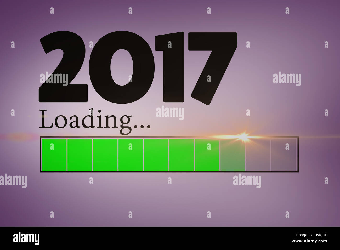 Composite image of green loading display Stock Photo - Alamy