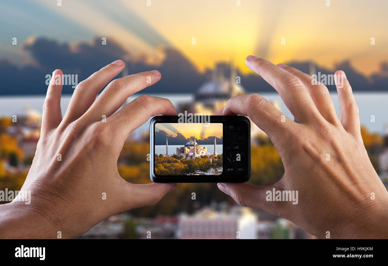 Taking picture with camera Stock Photo - Alamy